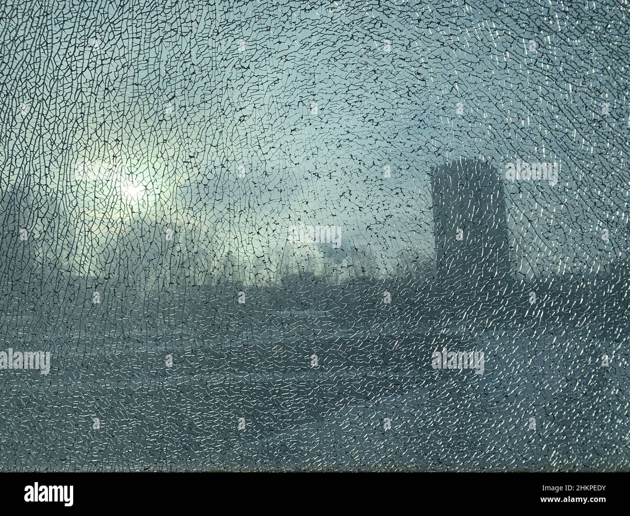 Broken window background. Blurred view from it Stock Photo - Alamy