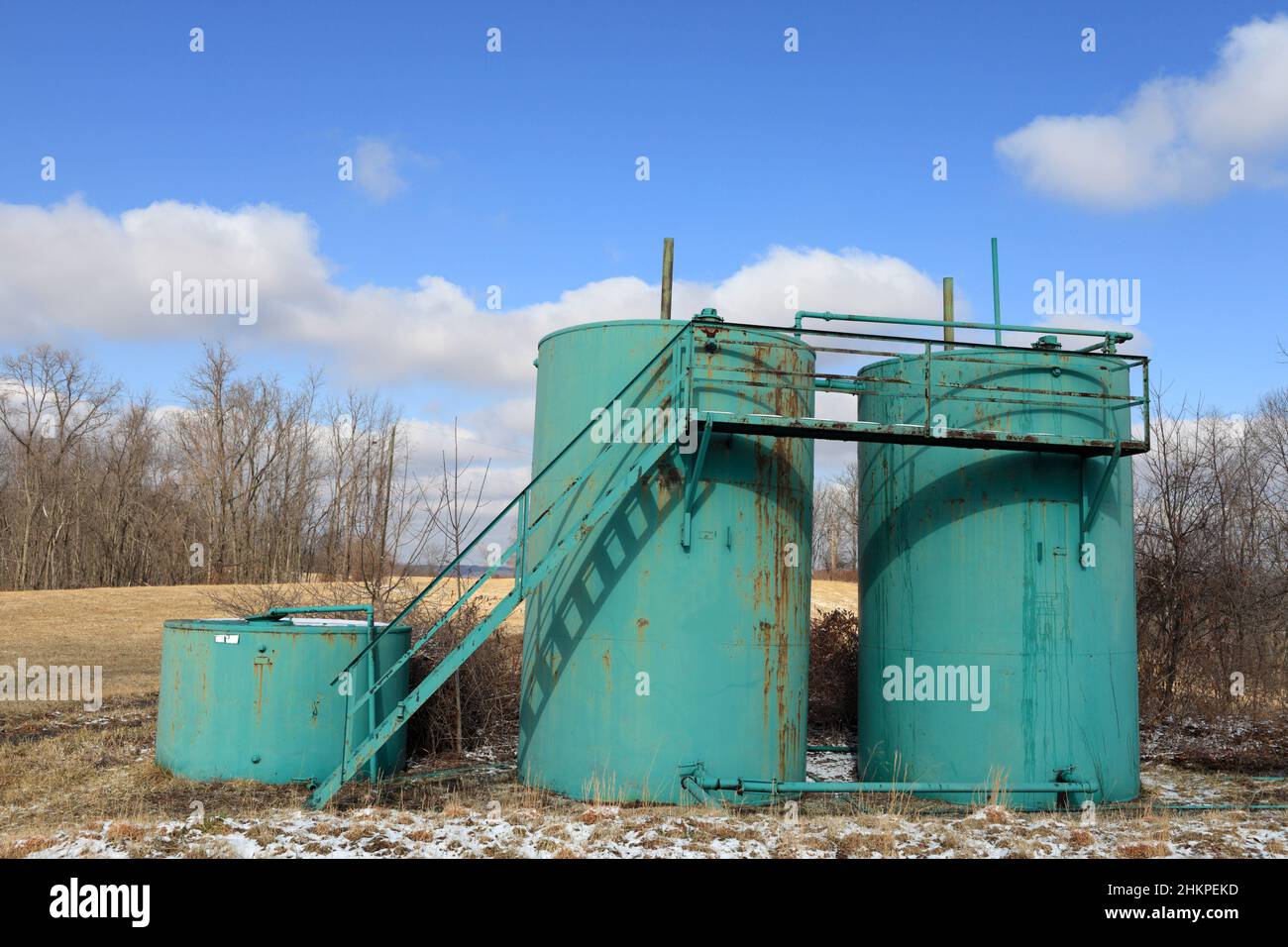 Three oil tanks on field, USA, Ohio Stock Photo - Alamy