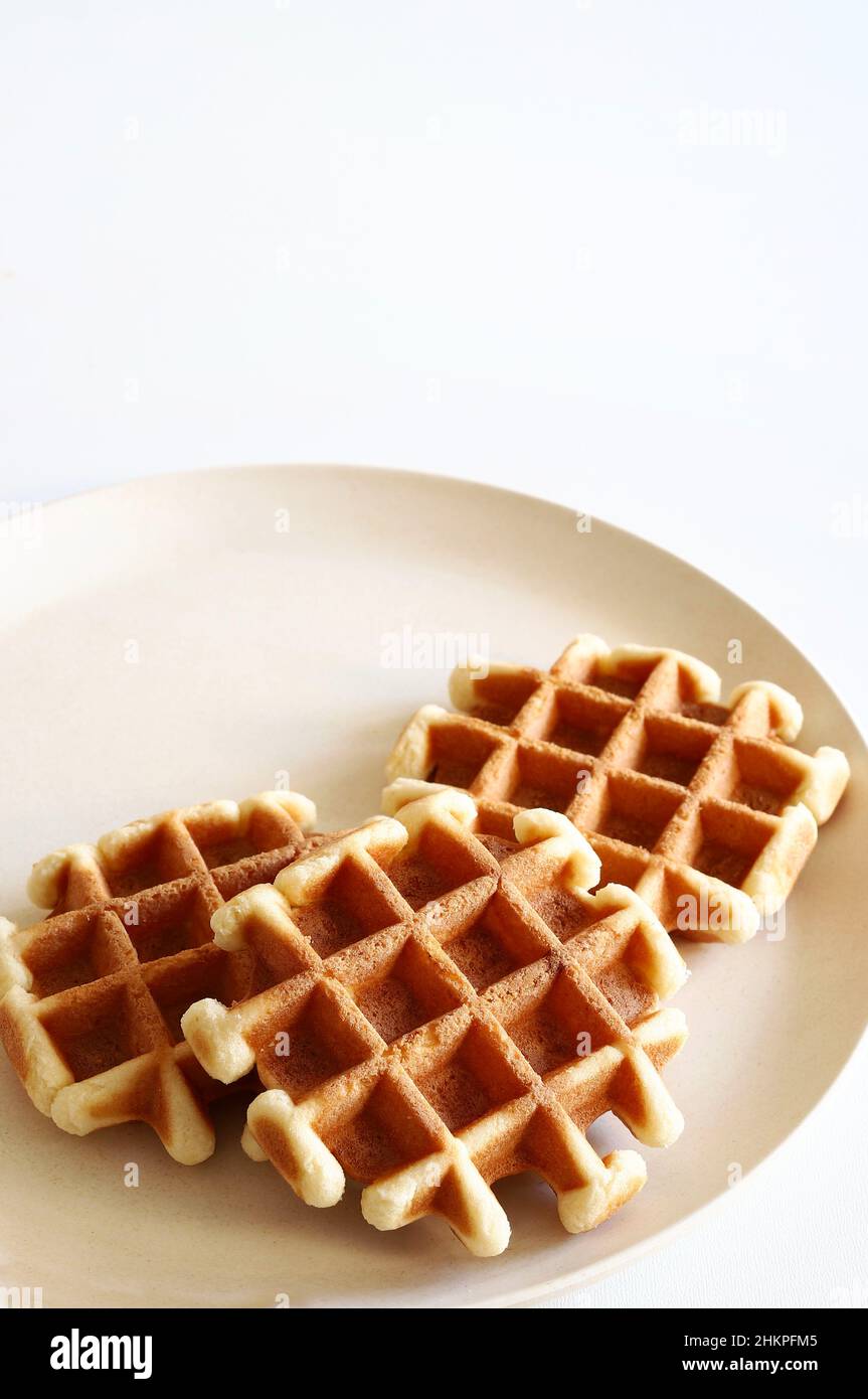 Homemade waffles, Belgian breakfast pastry dessert isolated on white ...