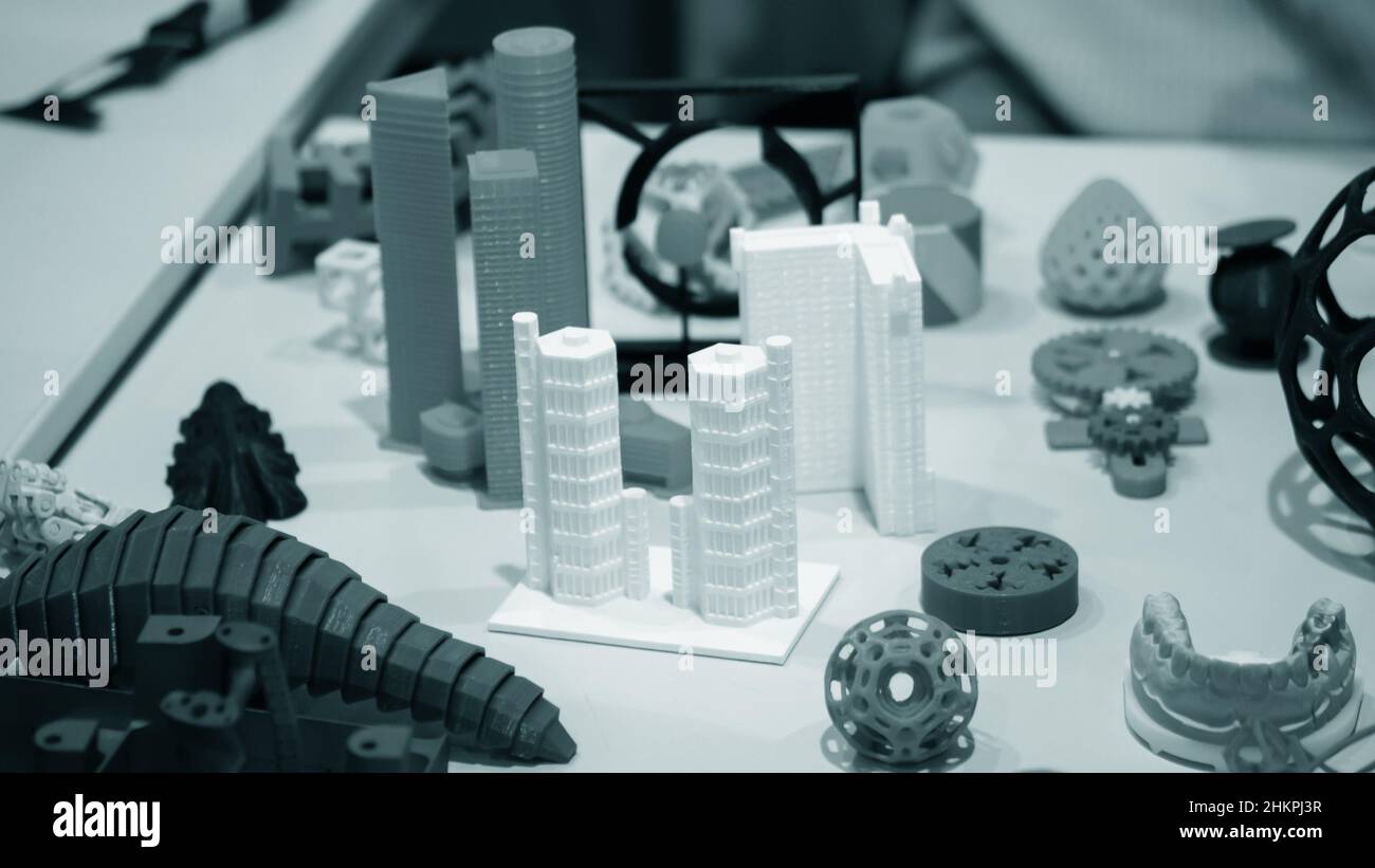Many abstract models bright colorful objects printed on a 3d printer ...