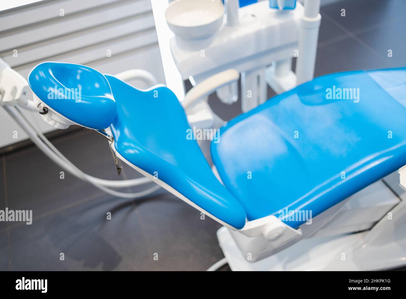 Blue dental chair in the office Stock Photo - Alamy