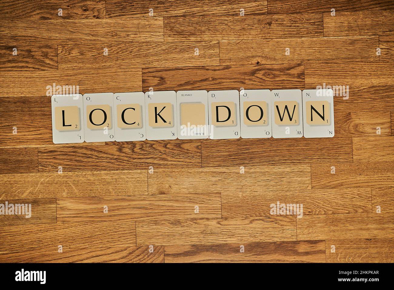 Scrabble letter cards spelling the corona covid 19 Pandemic related ...