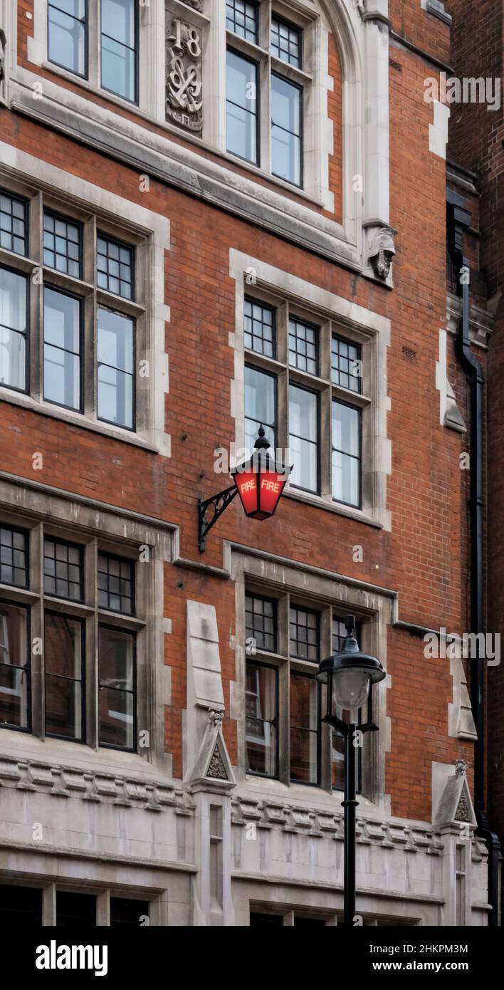 Old historical Fire Sign Lamp on a red brick building in Marylebone ...