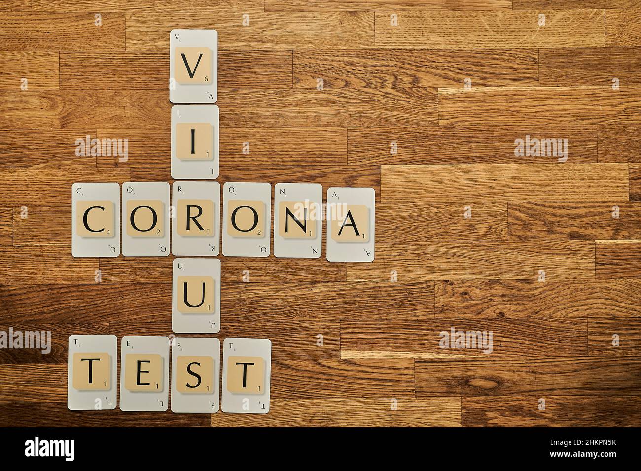 Scrabble letter cards spelling the corona covid 19 Pandemic related ...