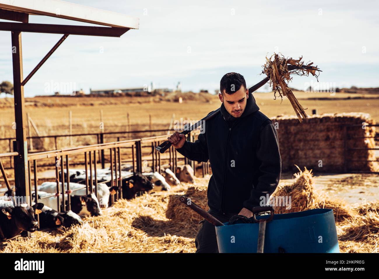 Young man on farm hi-res stock photography and images - Alamy
