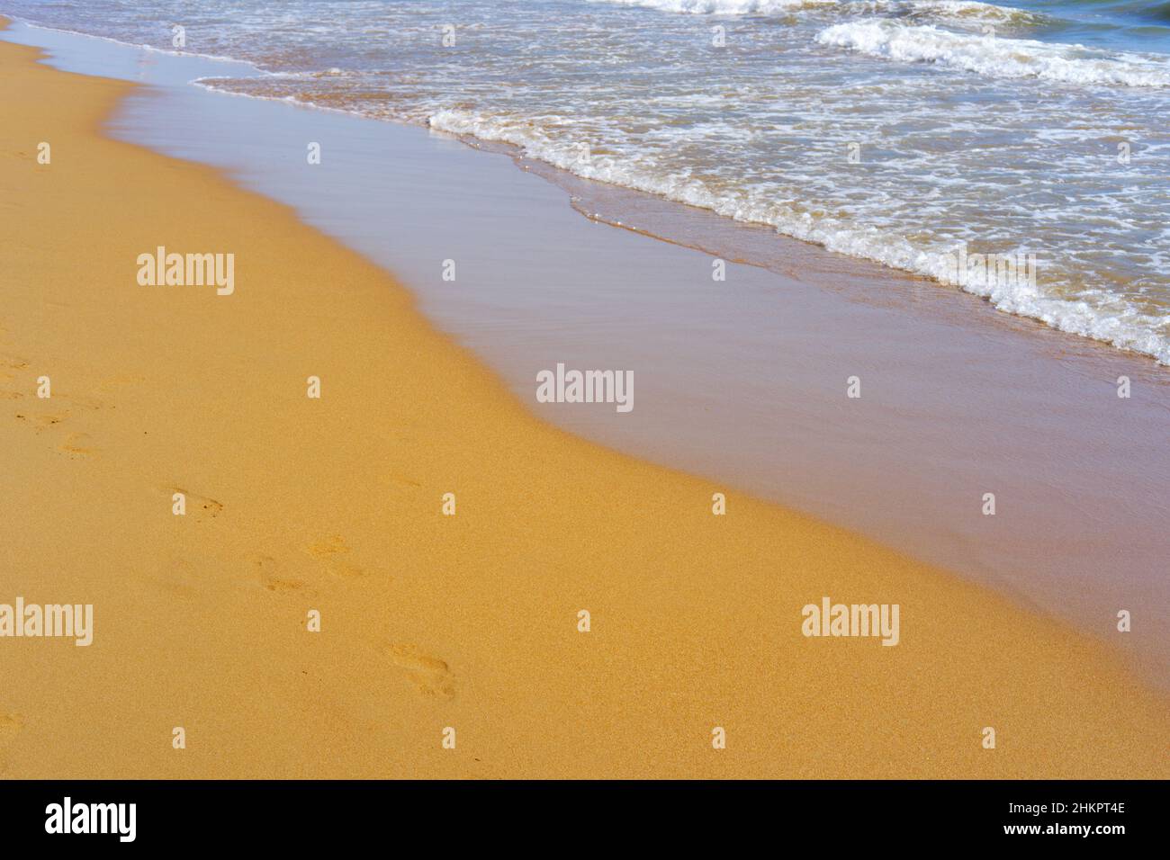 Waves at beautiful sandy beach in a sunny summer day in Antalya Turkey ...