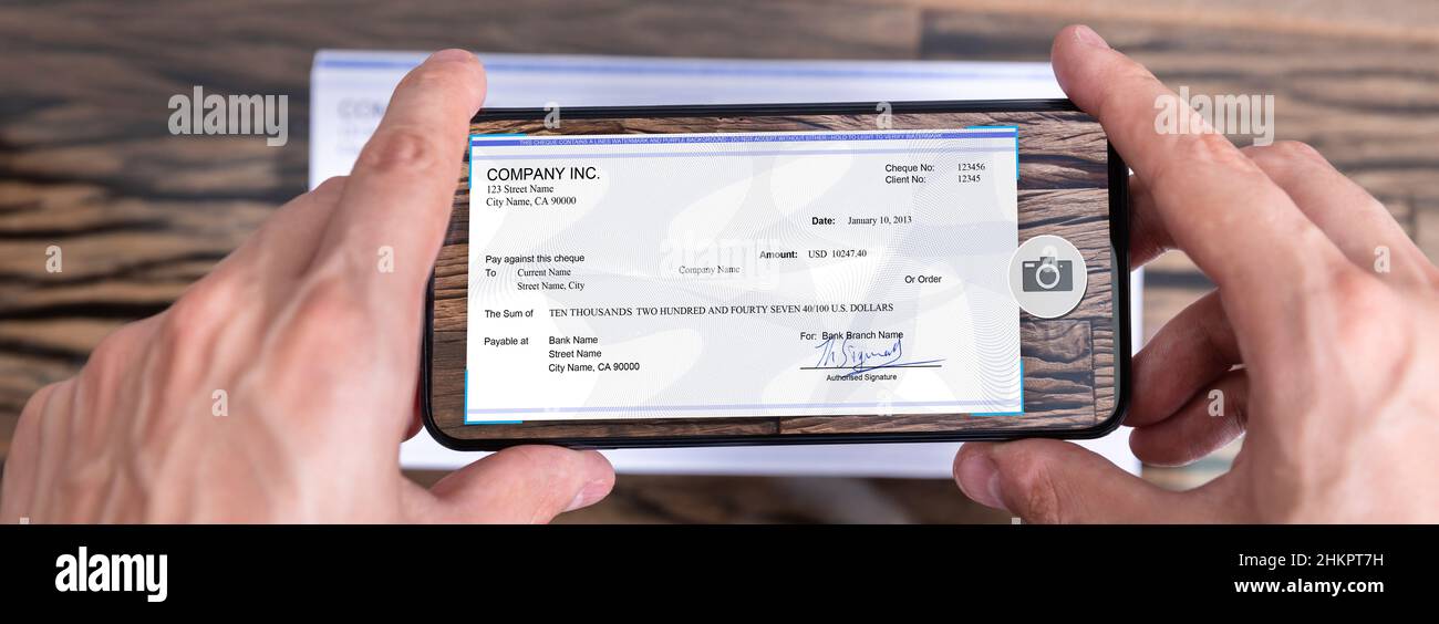 Remote Cheque Deposit Using Mobile Phone. Check Capture Stock Photo - Alamy