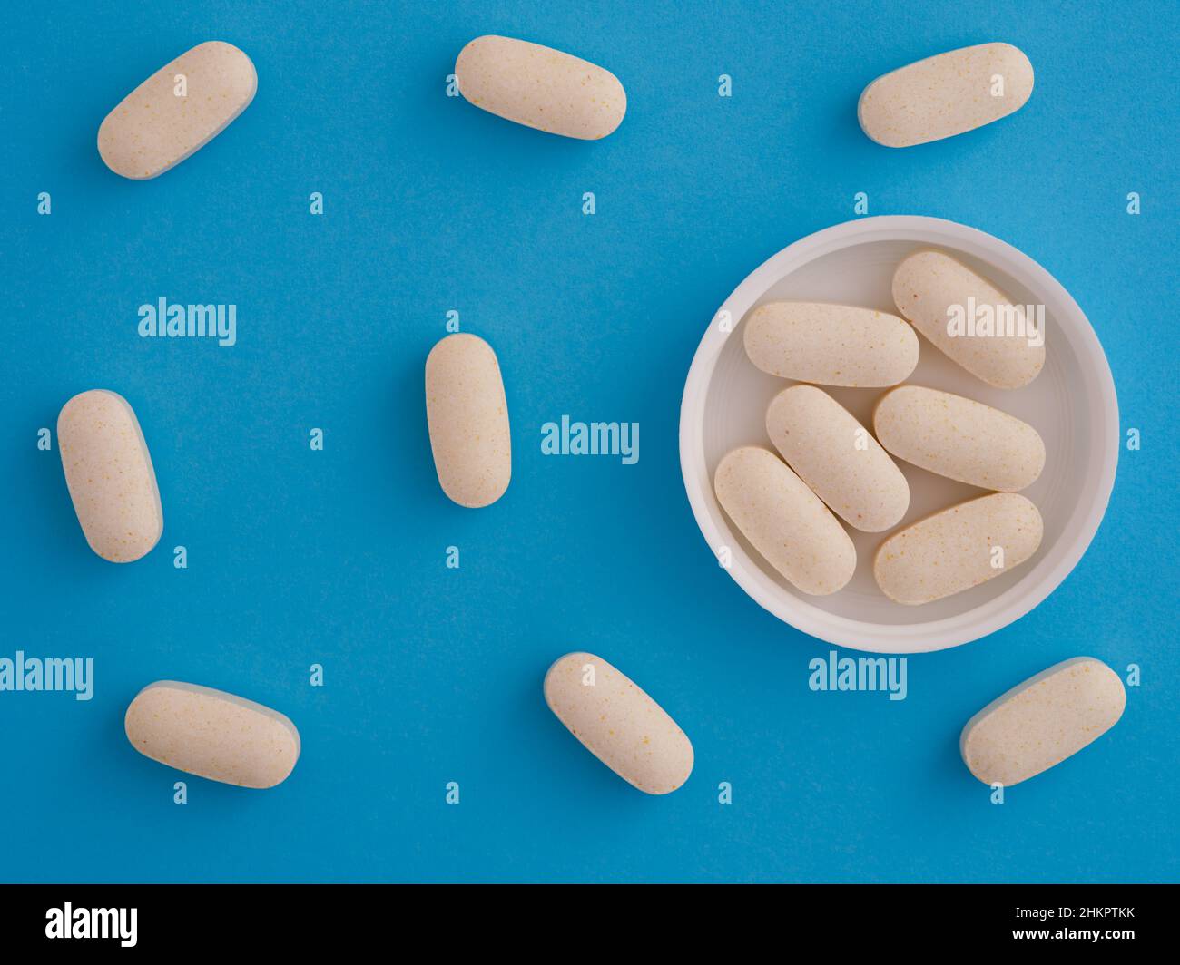 Magnesium Taurate tablets in a cap with other magnesium taurate tablets ...