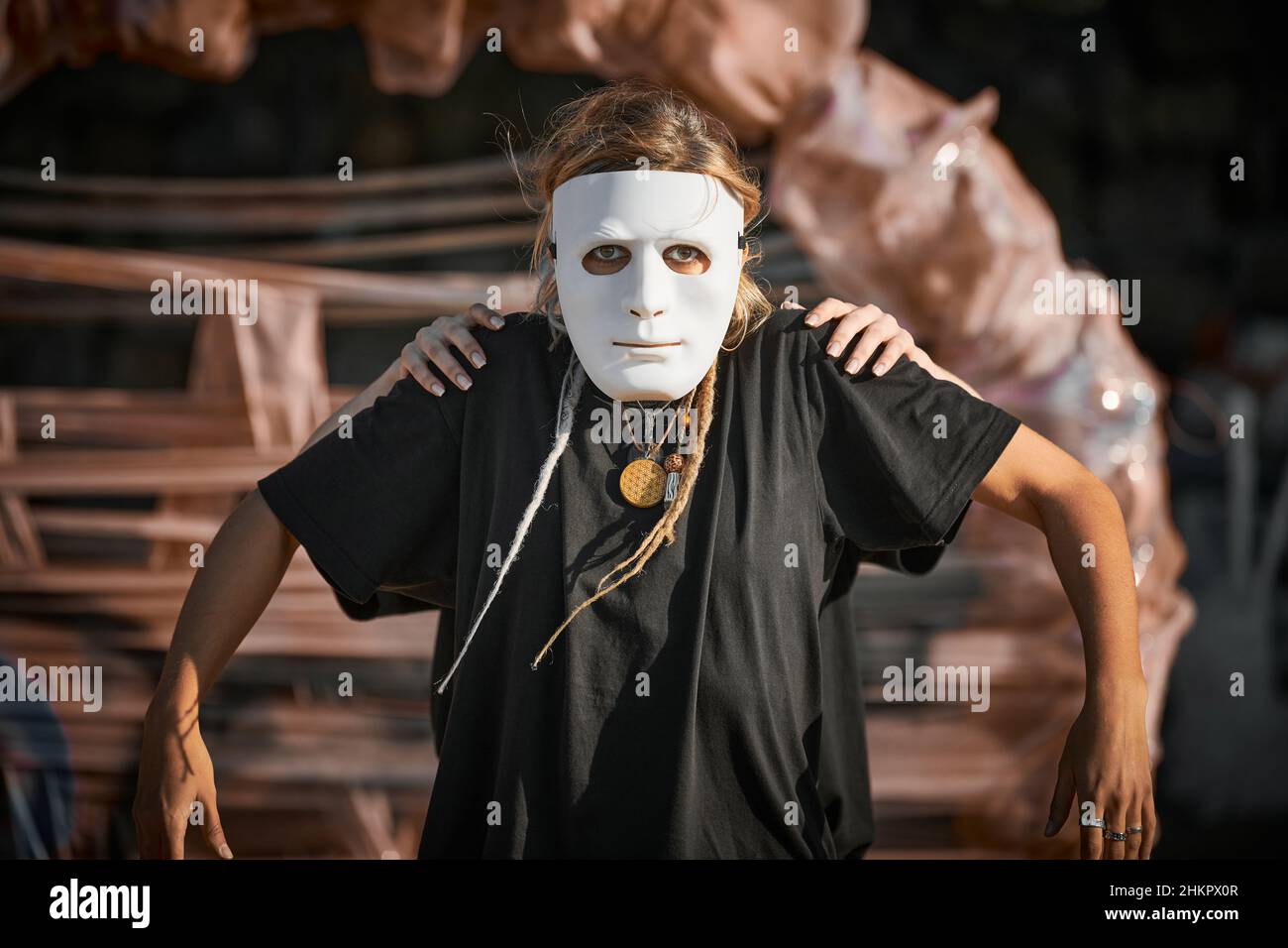 Two girls acting in white theater mask dancing on art theatrical ...