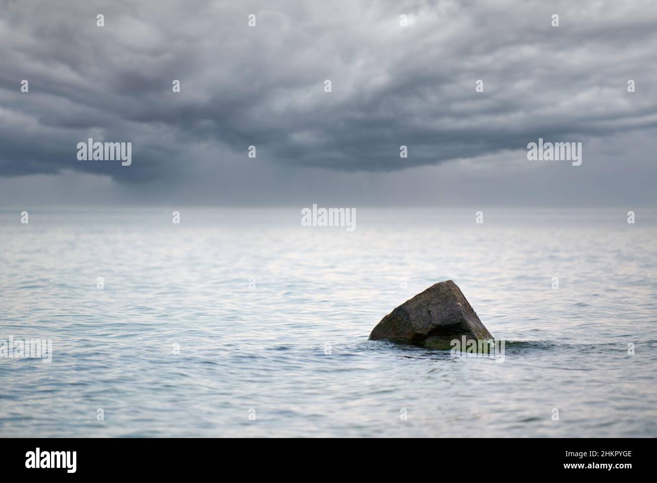 Dramatic seascape with cloudy storm warning on horizon. Rain clouds ...