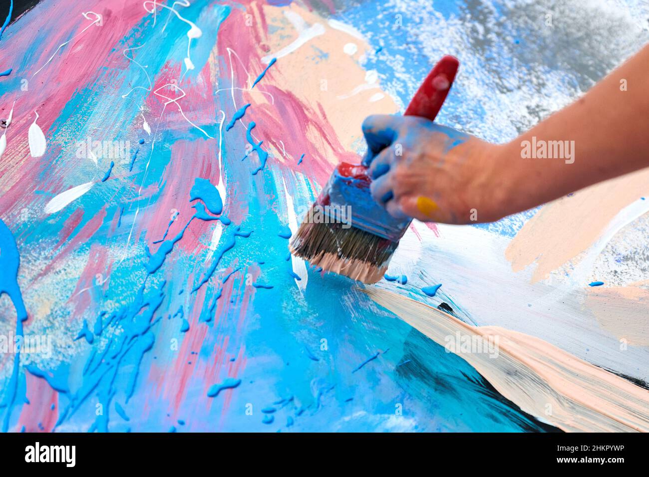 Drip painting expression art on canvas with blue, pink and beige colors ...