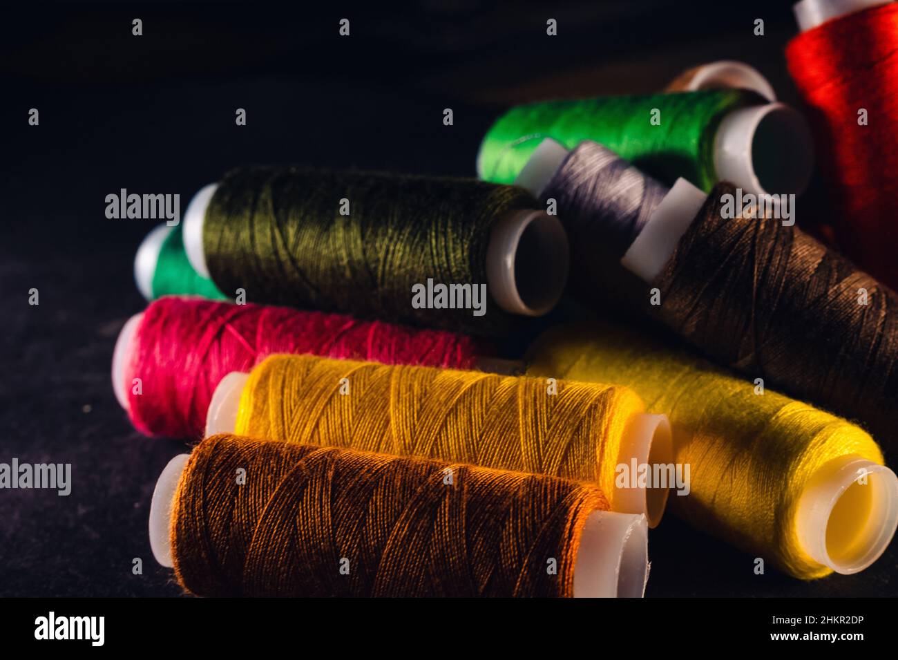 Selective focus shot of colorful rope rolls for sewing Stock Photo - Alamy