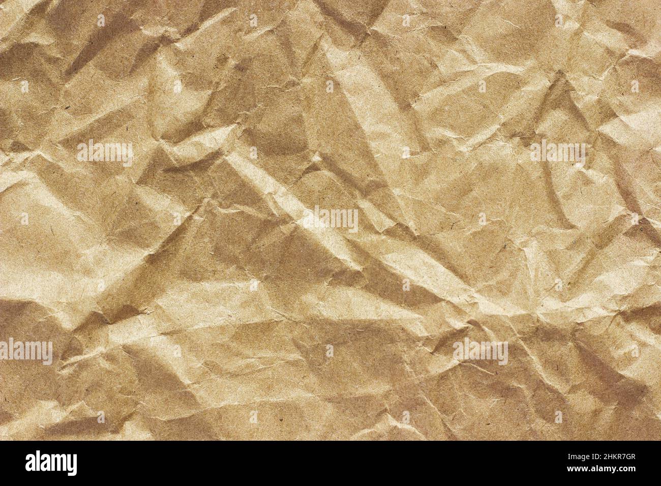 Texture of coarse crumpled brown paper, used for food packaging ...