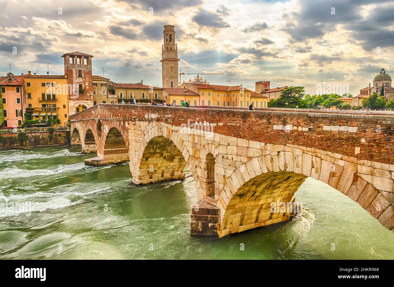 Ancient Roman Bridge called Ponte di Pietra above the Adige River in Verona, Italy Stock Photo ...