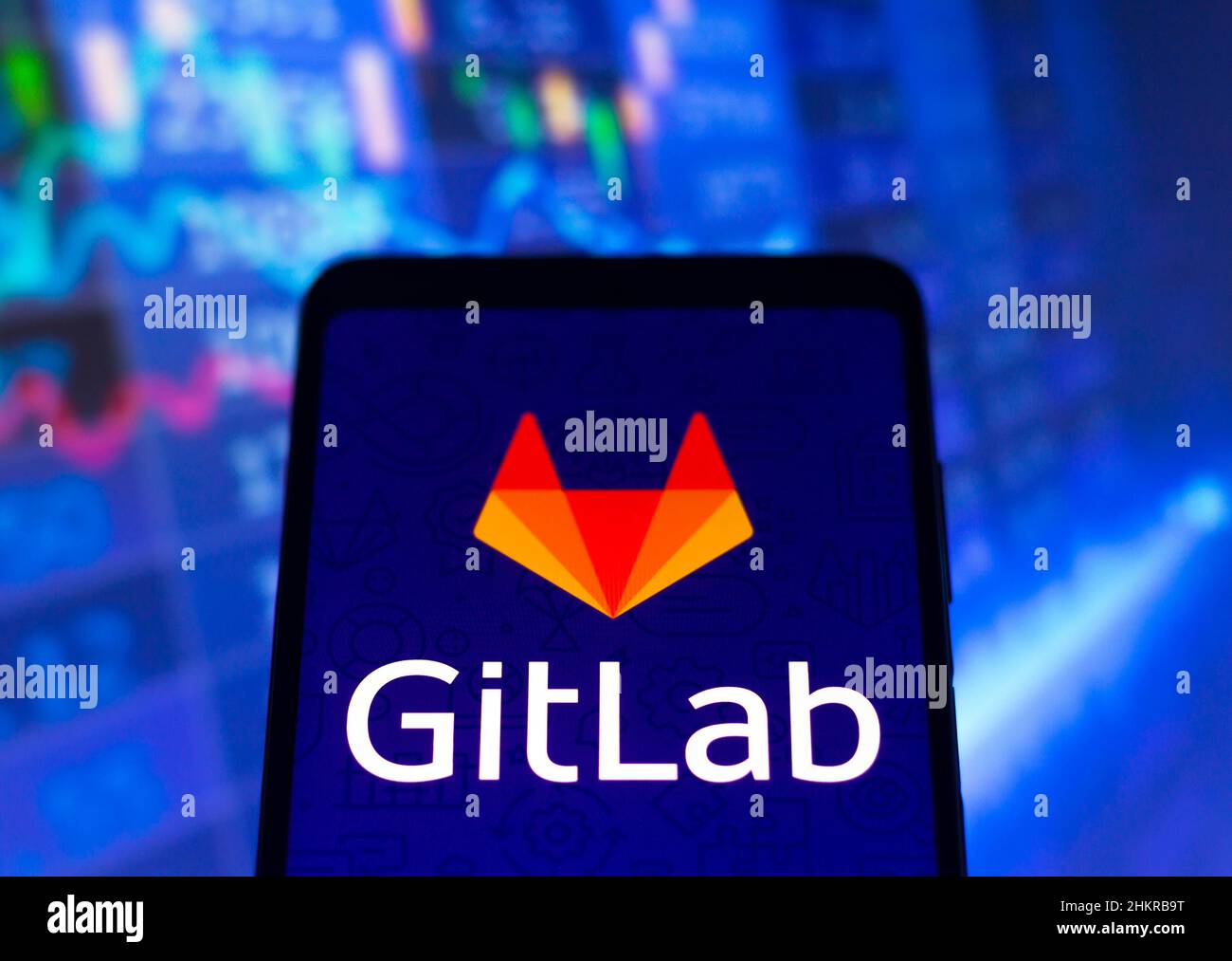 In this photo illustration the GitLab logo seen displayed on a ...