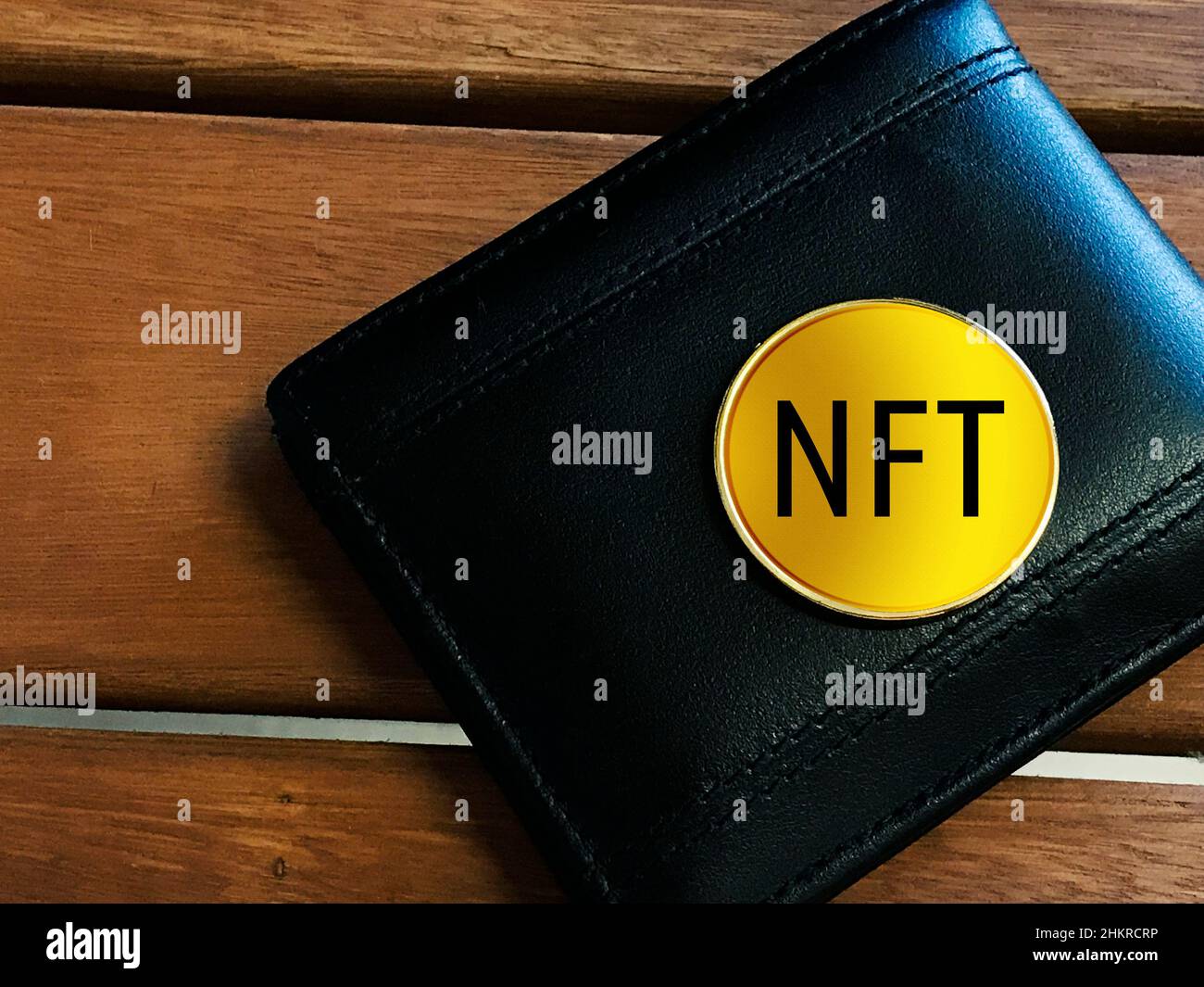 NFT Gold Coin, brazilian money and Wallet on wood table Stock Photo - Alamy