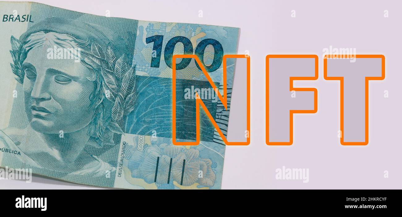 NFT written with brazilian money background Stock Photo - Alamy