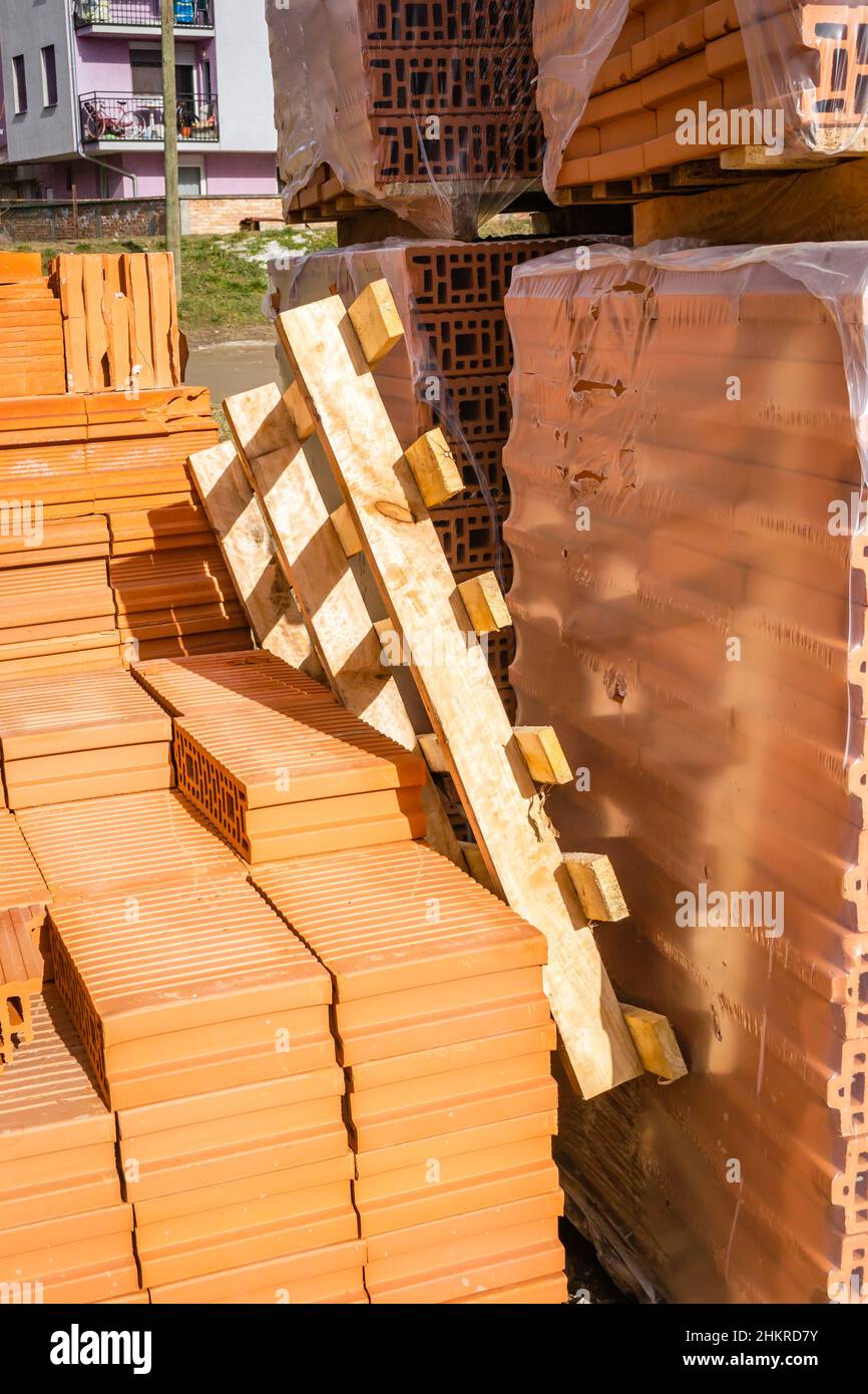 Wooden pallet on a pile of blocks for the construction of a residential ...