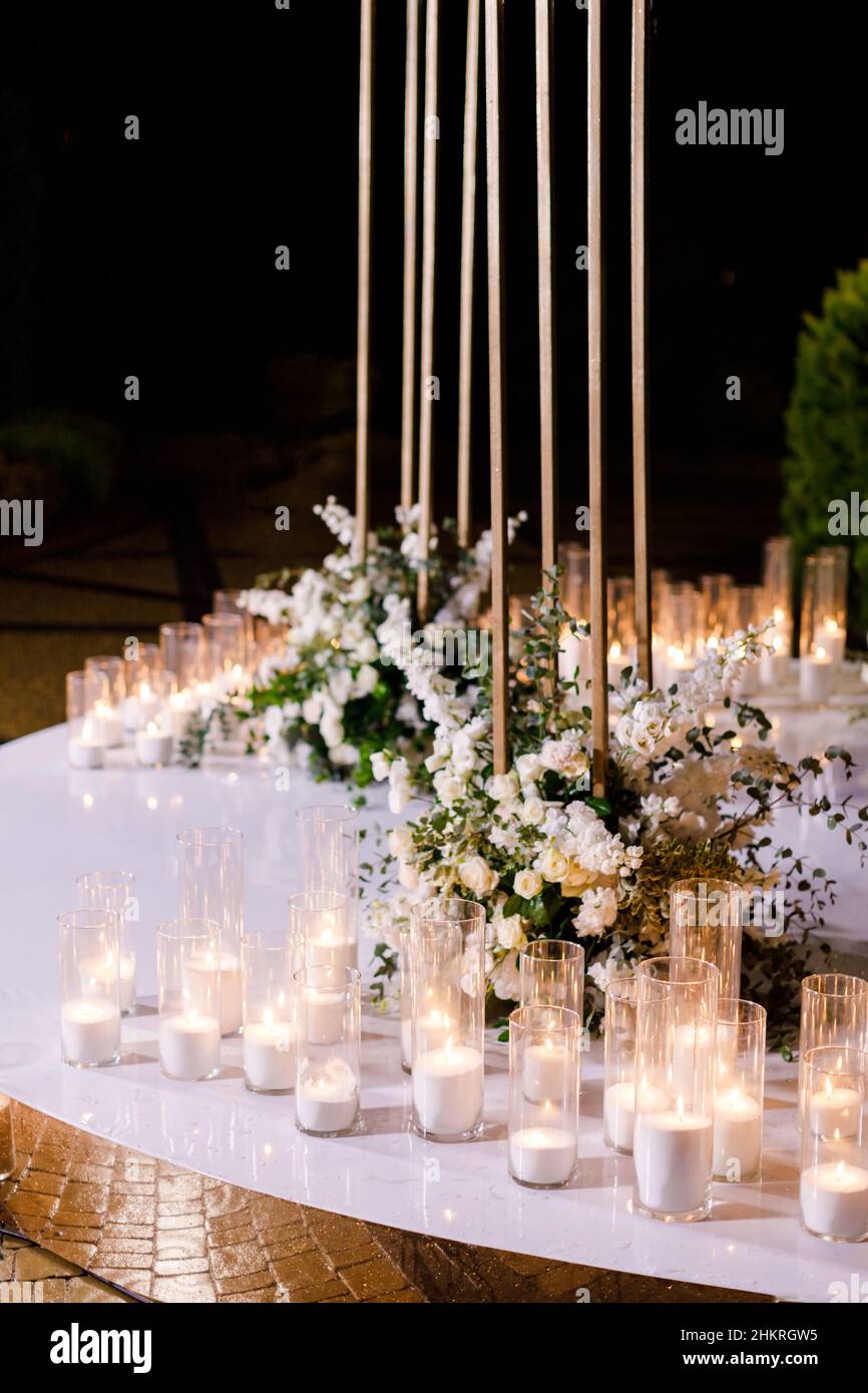 Night wedding ceremony with a lot of lights, candles, lanterns ...