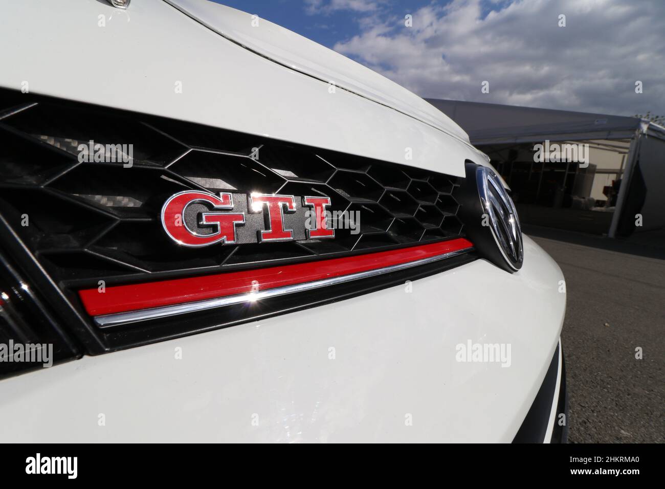 Front part of white Volkswagen Golf Seven GTI Stock Photo - Alamy