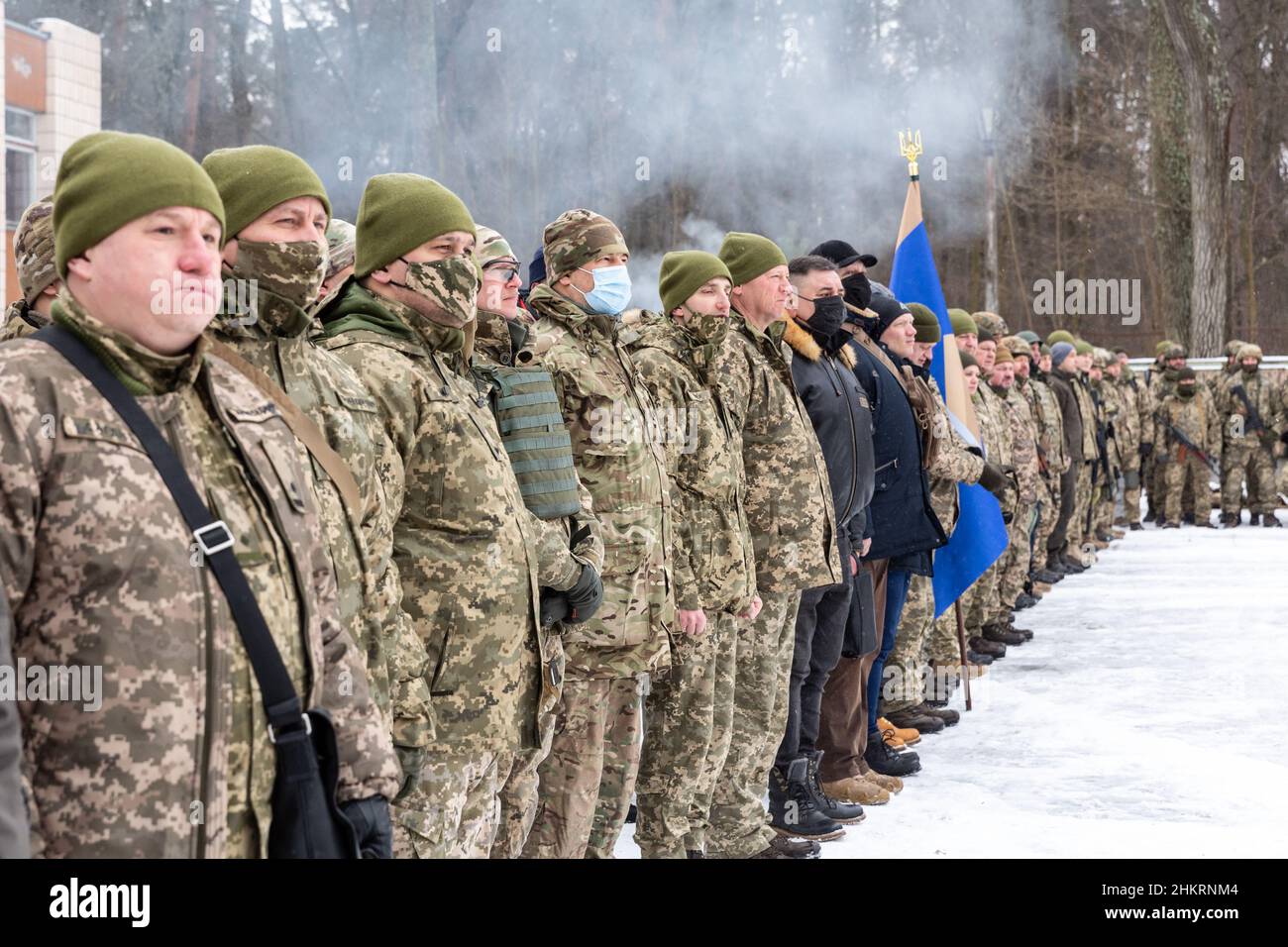 Civilians stand in line during Territorial Defence Force exercise ...