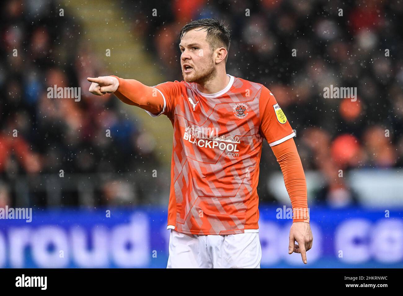 Jordan Thorniley #34 of Blackpool gives his team instructions Stock ...