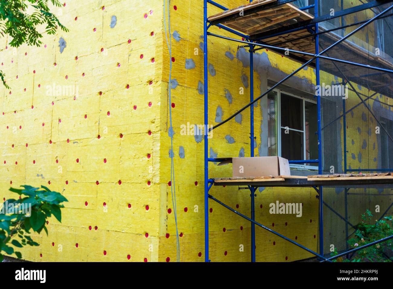 Insulation of the walls of a multi-storey building, construction of a ...