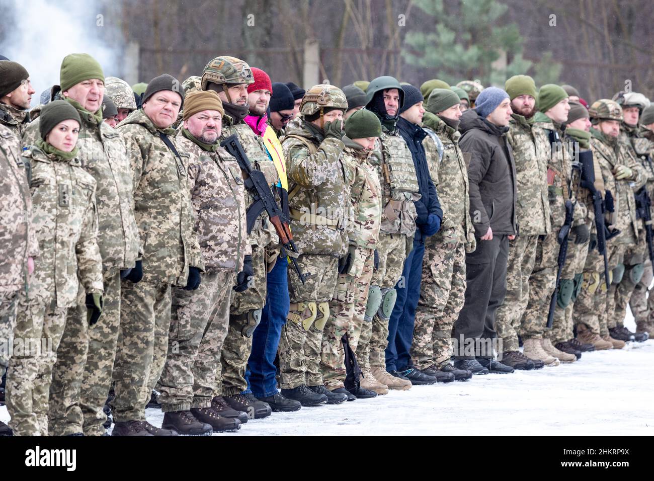 Civilians stand in line during Territorial Defence Force exercise ...