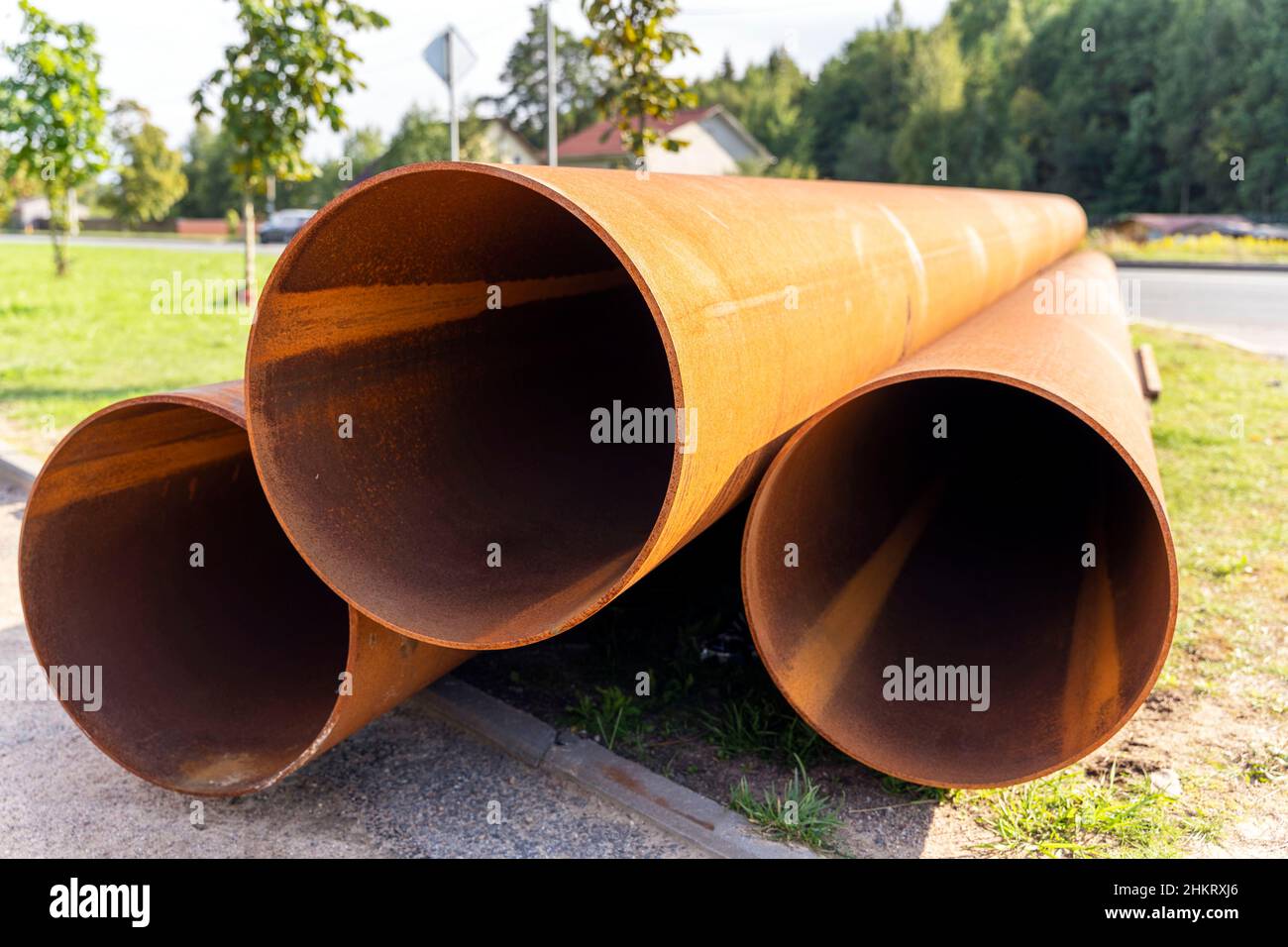Large diameter pipes, Large rusty metal pipes Stock Photo - Alamy