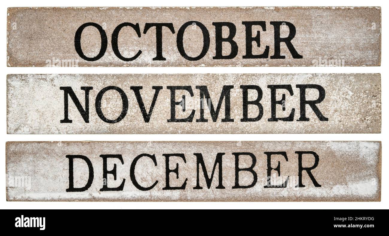 October, November and December months - rough text on grunge wooden ...