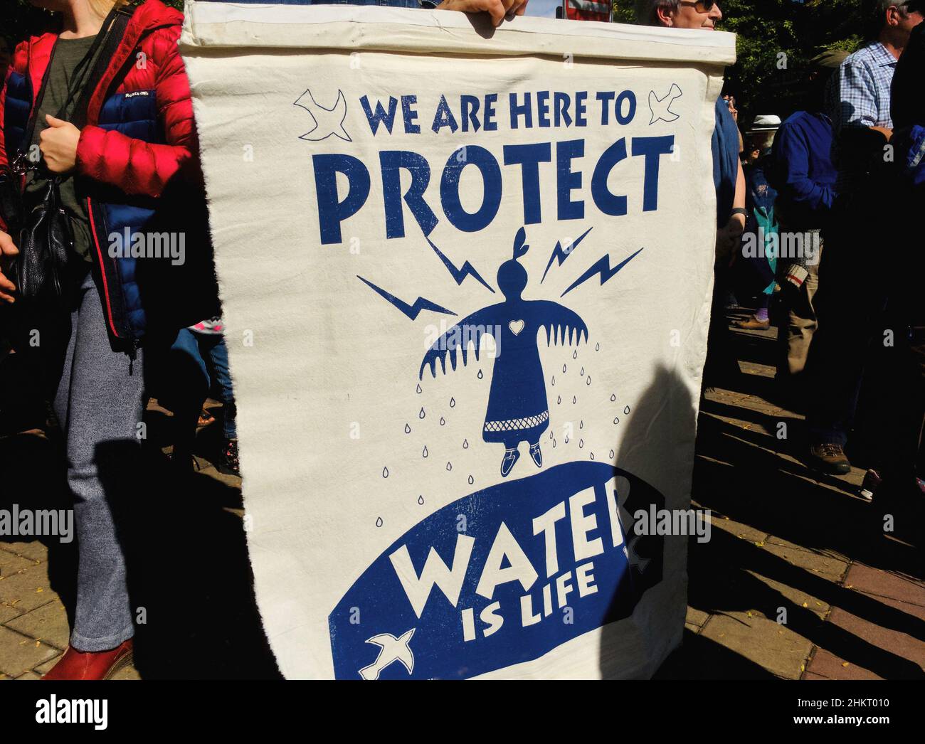 Indigenous protest banner at an Earth Guardians Climate Strike Rally in ...