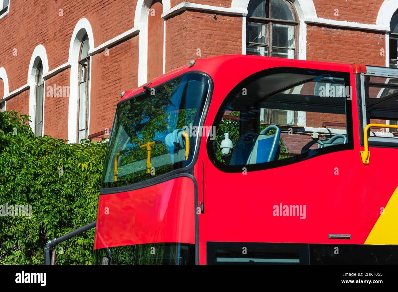 The second floor of a double-decker tourist bus, the windows of the bus ...