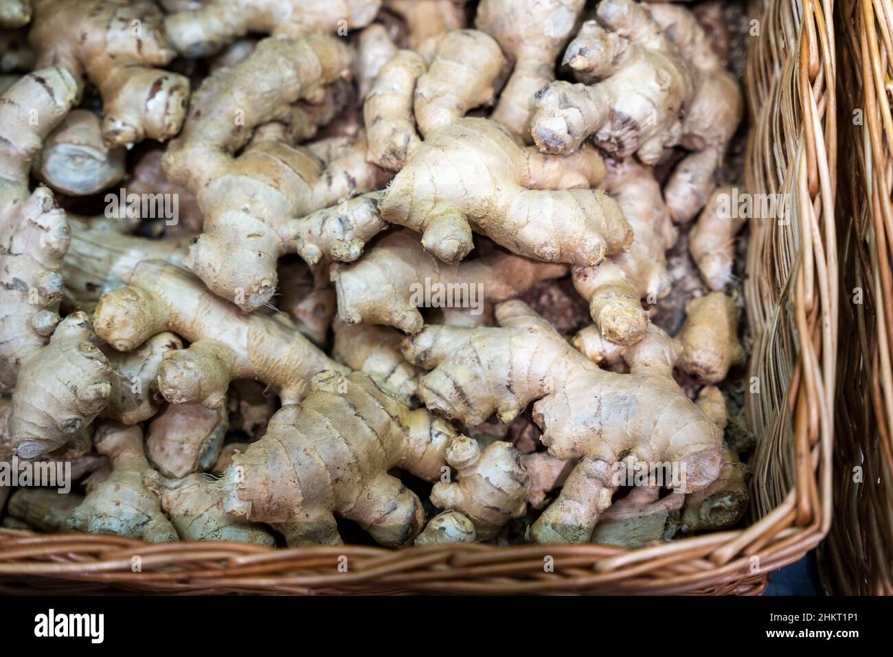 Ginger in a basket on the supermarket counter, sell ginger roots in a ...