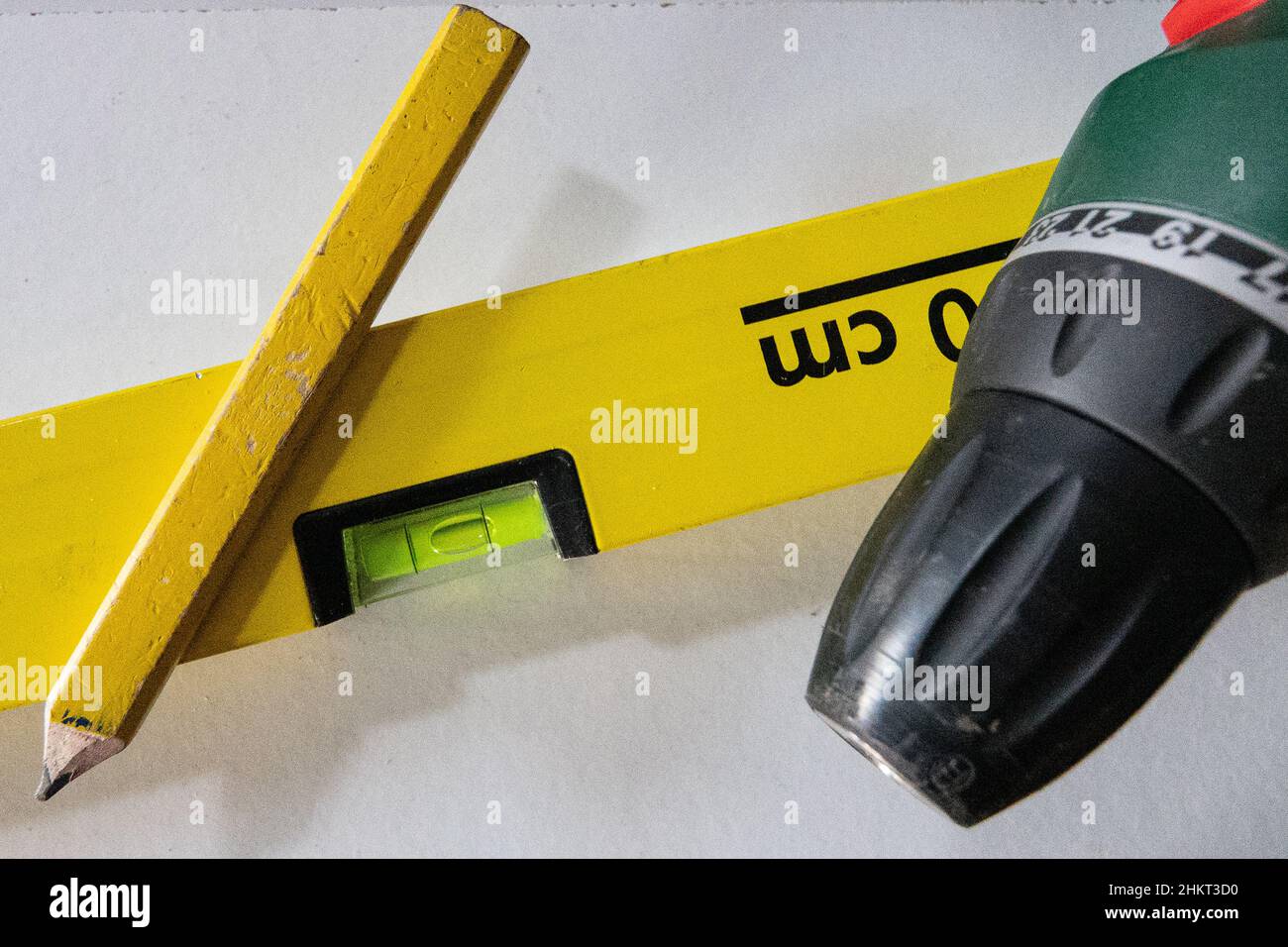 spirit level and yellow pencil Stock Photo - Alamy