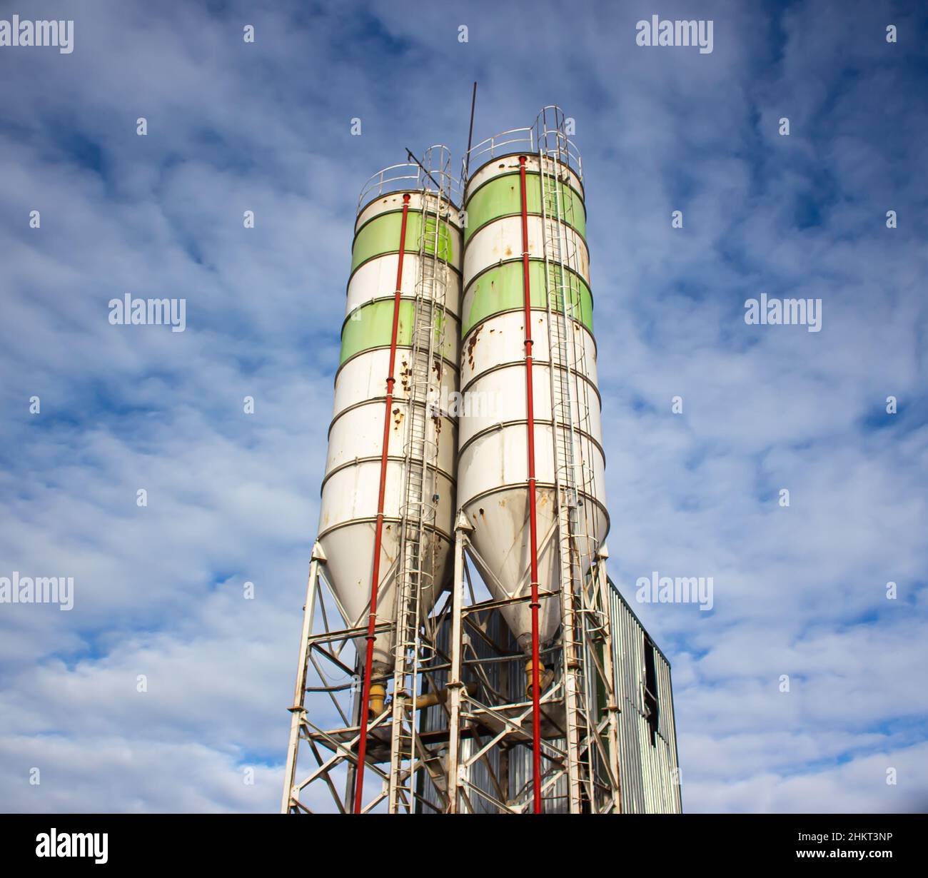 Cement mixing silo of concrete batching plant with blue sky Stock Photo ...