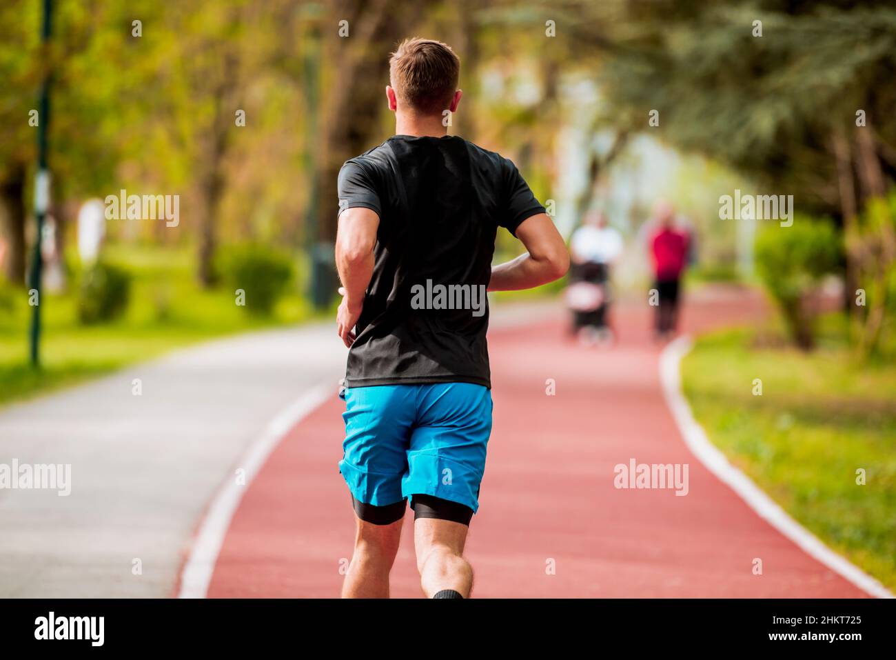 Sport and healthy fitness. Portrait of Caucasian guy in a blue shorts ...