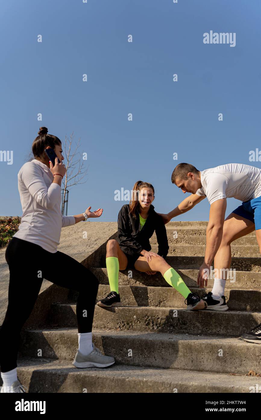 Two amazing and attractive fit friends are helping her with the injury ...