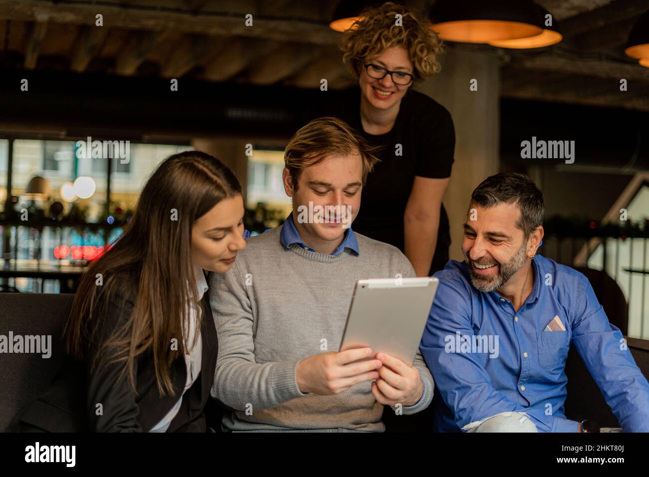 Four amazing business people are having a discission about the plans ...