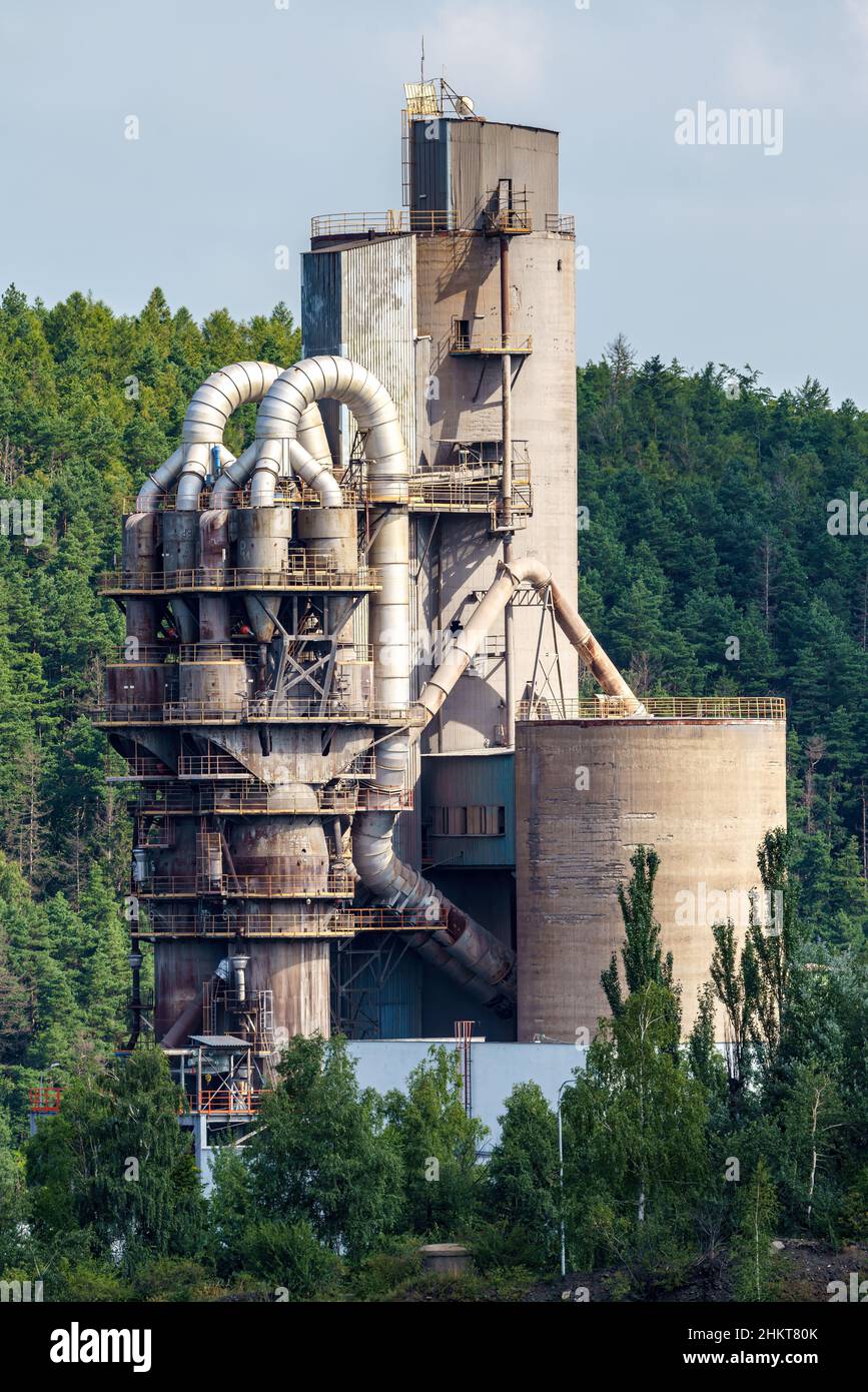 Cement factory, quarry with silos and industrial equipment. Limestone ...