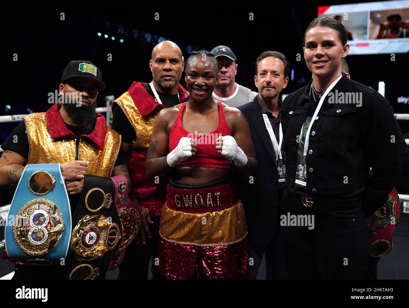 Claressa Shields (centre) and her team celebrate victory against Ema Kozin (not pictured) in the ...