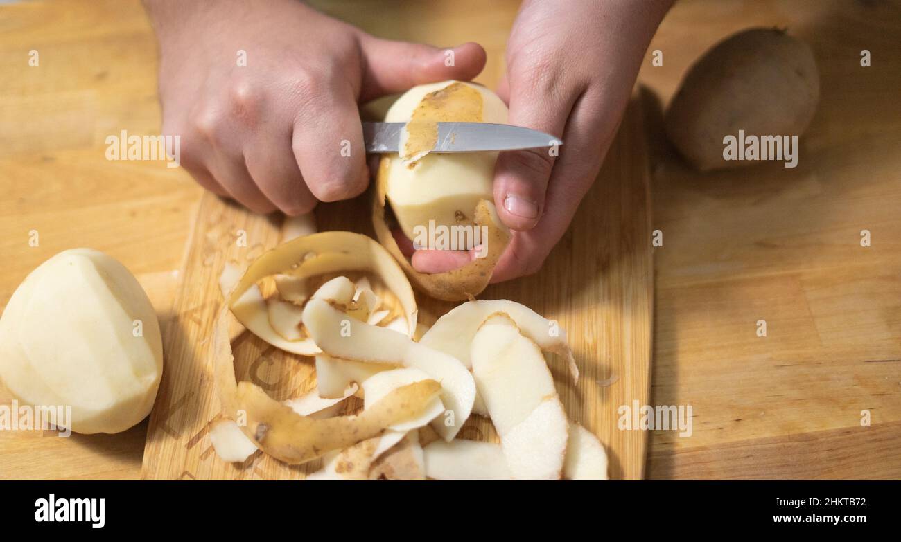Peeling potato brown hi-res stock photography and images - Alamy
