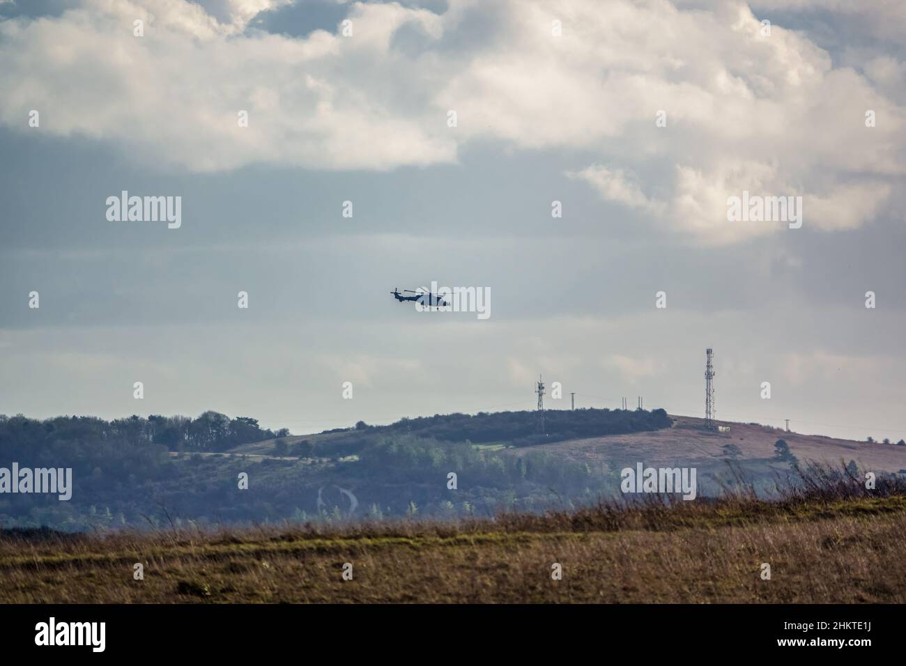 British army AgustaWestland AW159 Wildcat AH1 helicopter flying over ...