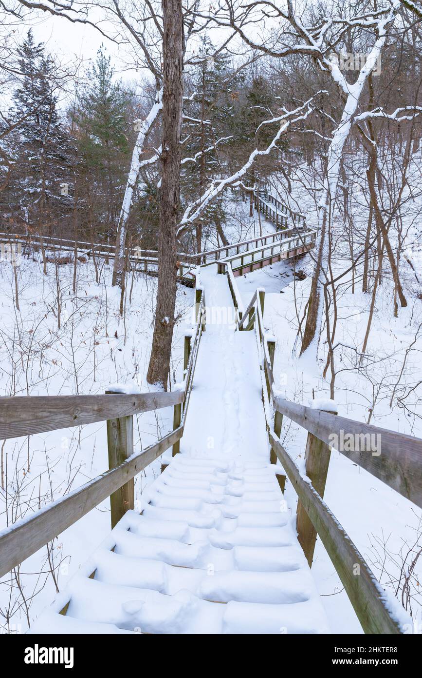 Wooden pathway along the snow covered landscape. Starved Rock State ...