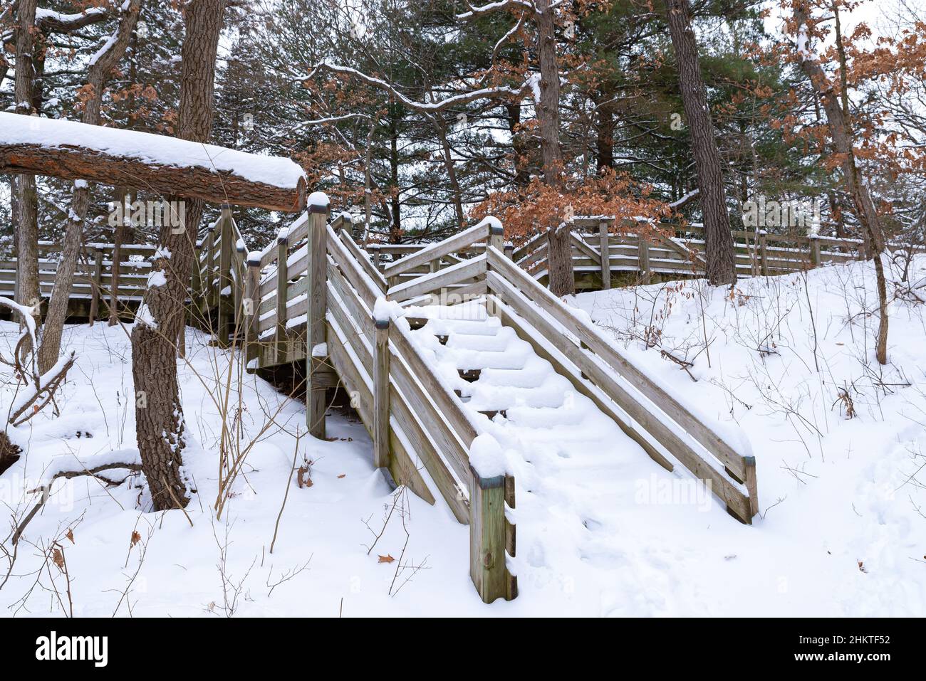 Wooden pathway along the snow covered landscape. Starved Rock State ...