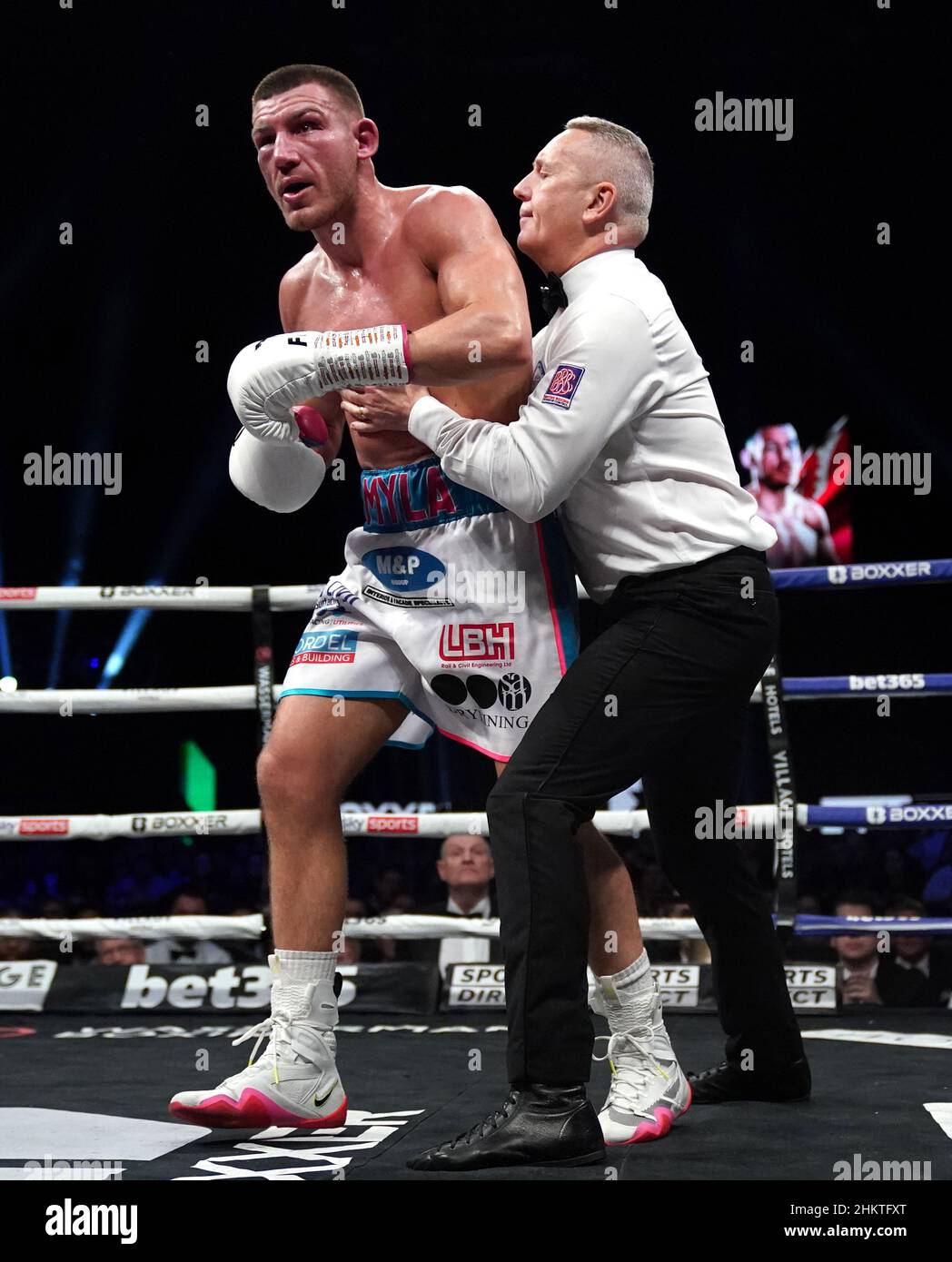Liam Williams held back by the referee in the middleweight contest at ...