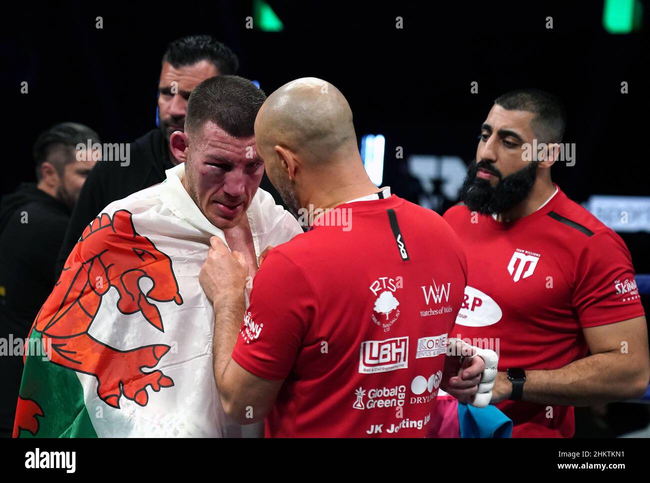 Liam Williams (left) consoled by trainer Adam Booth after the ...