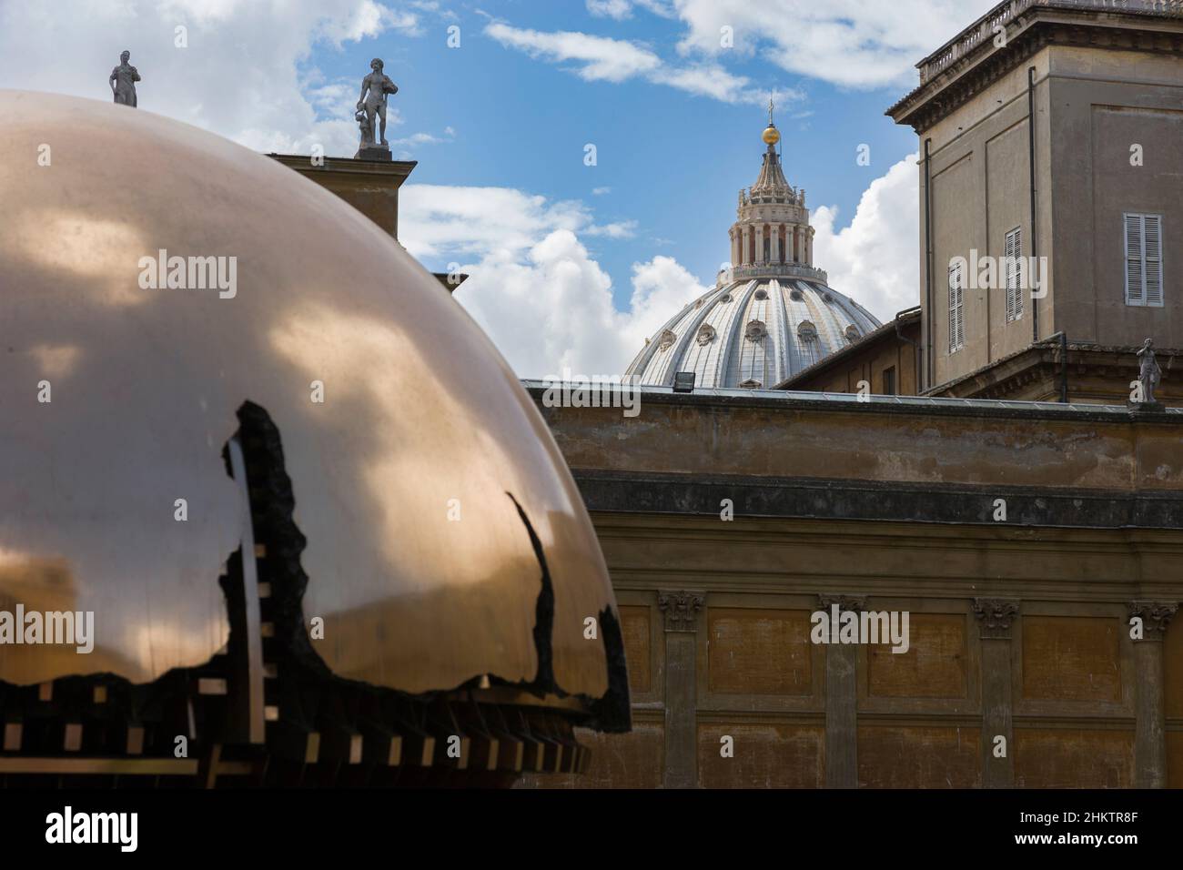 Arnaldo Pomodoro's, Sfera con Sfera sculpture and Saint Peter Basilica ...