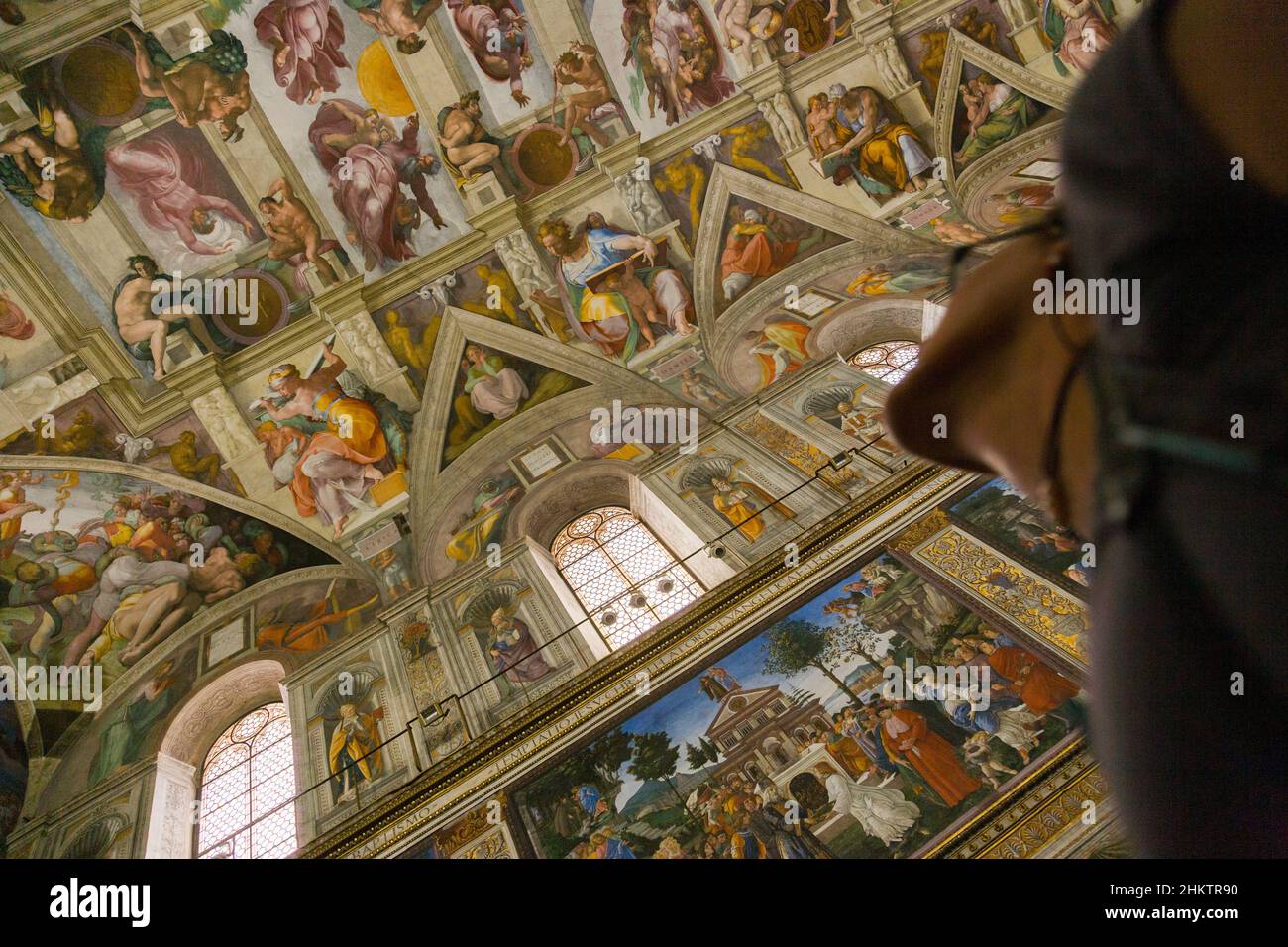 Woman looking up to the Sistine Chapel's ceiling, Vatican City, Rome ...