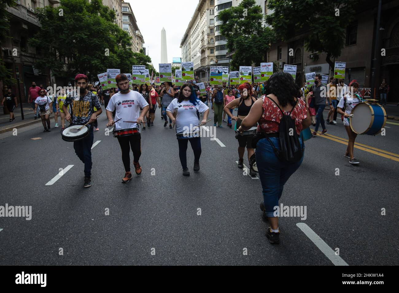 Activists march with drums and musical instruments during the ...