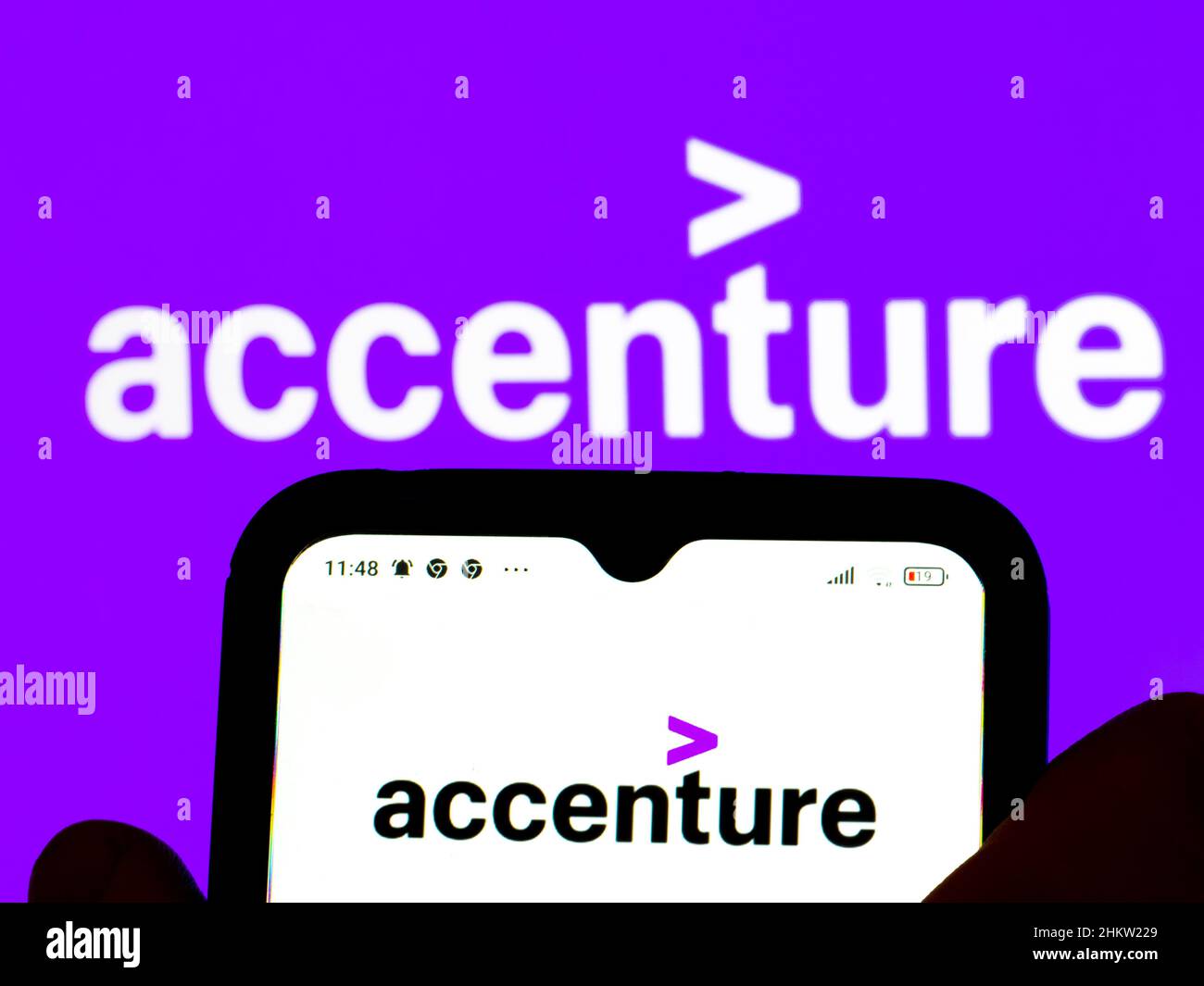 In this photo illustration, the Accenture logo is displayed on a ...